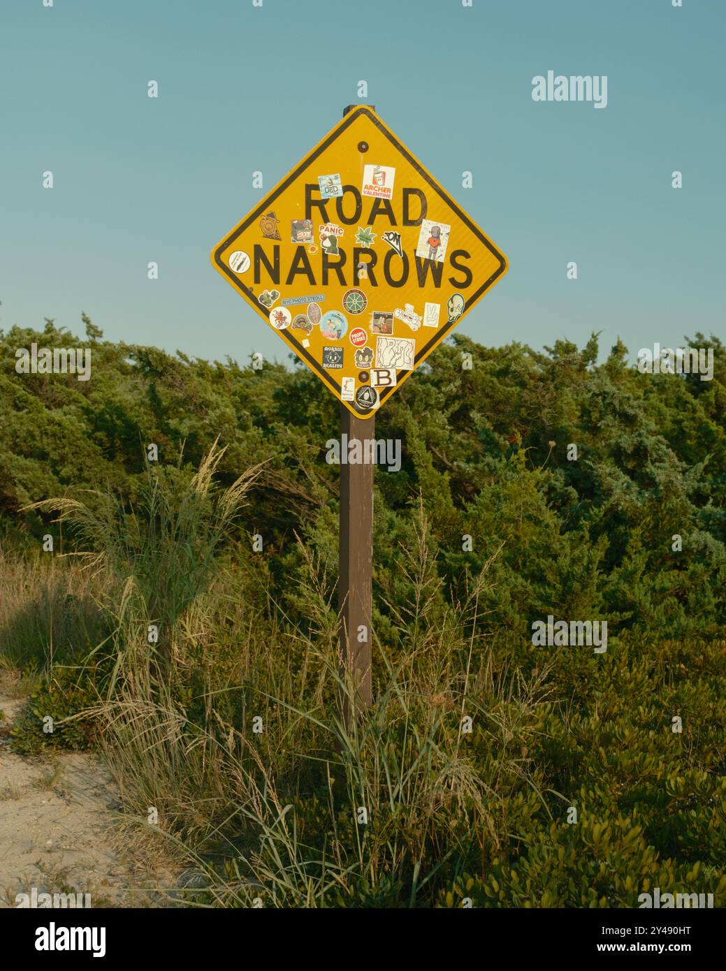 Road narrows sign at Fire Island, New York Stock Photo - Alamy