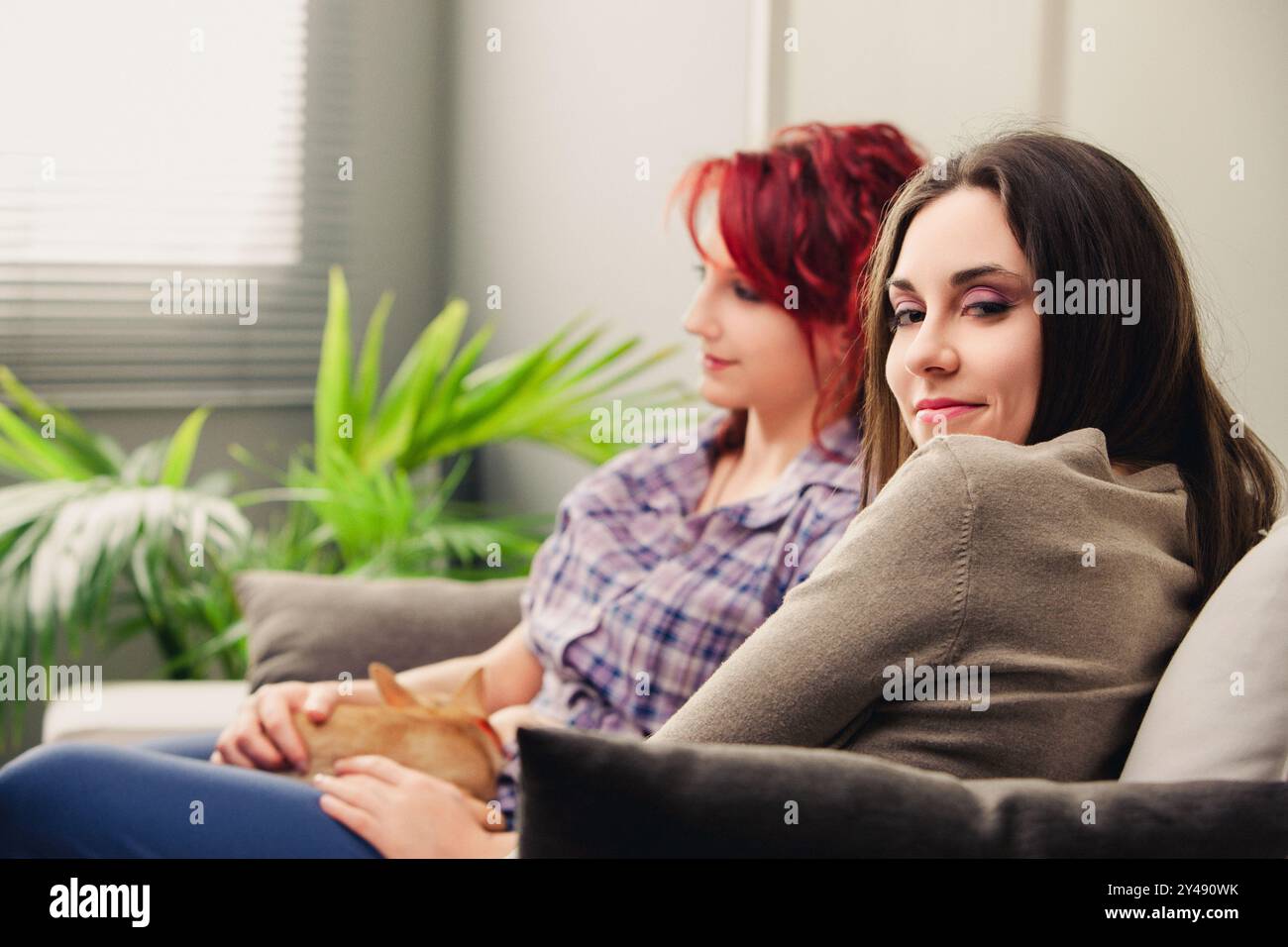 Direct engagement from one woman with the audience contrasts with her ...