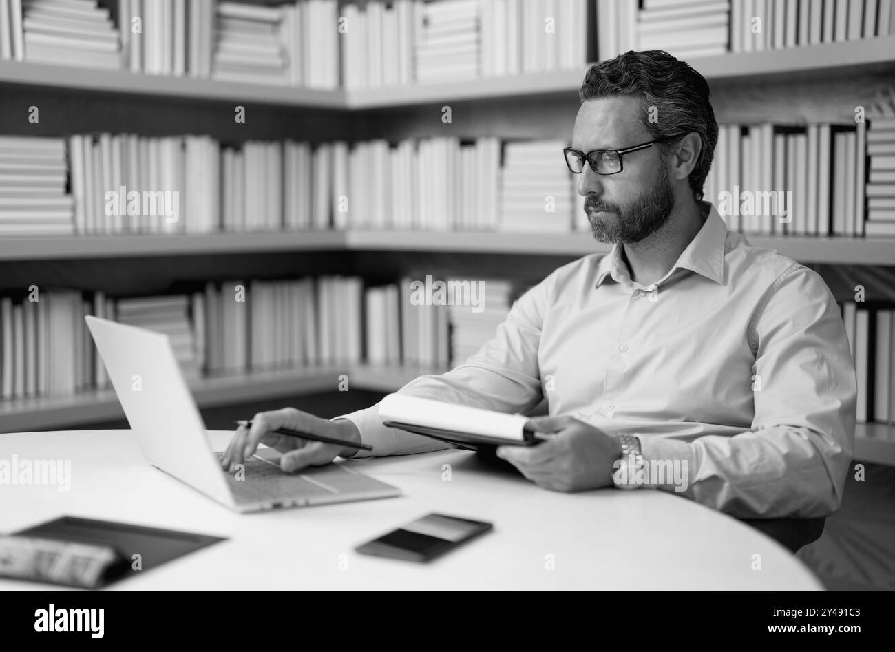 Laptop middle aged Black and White Stock Photos & Images - Alamy