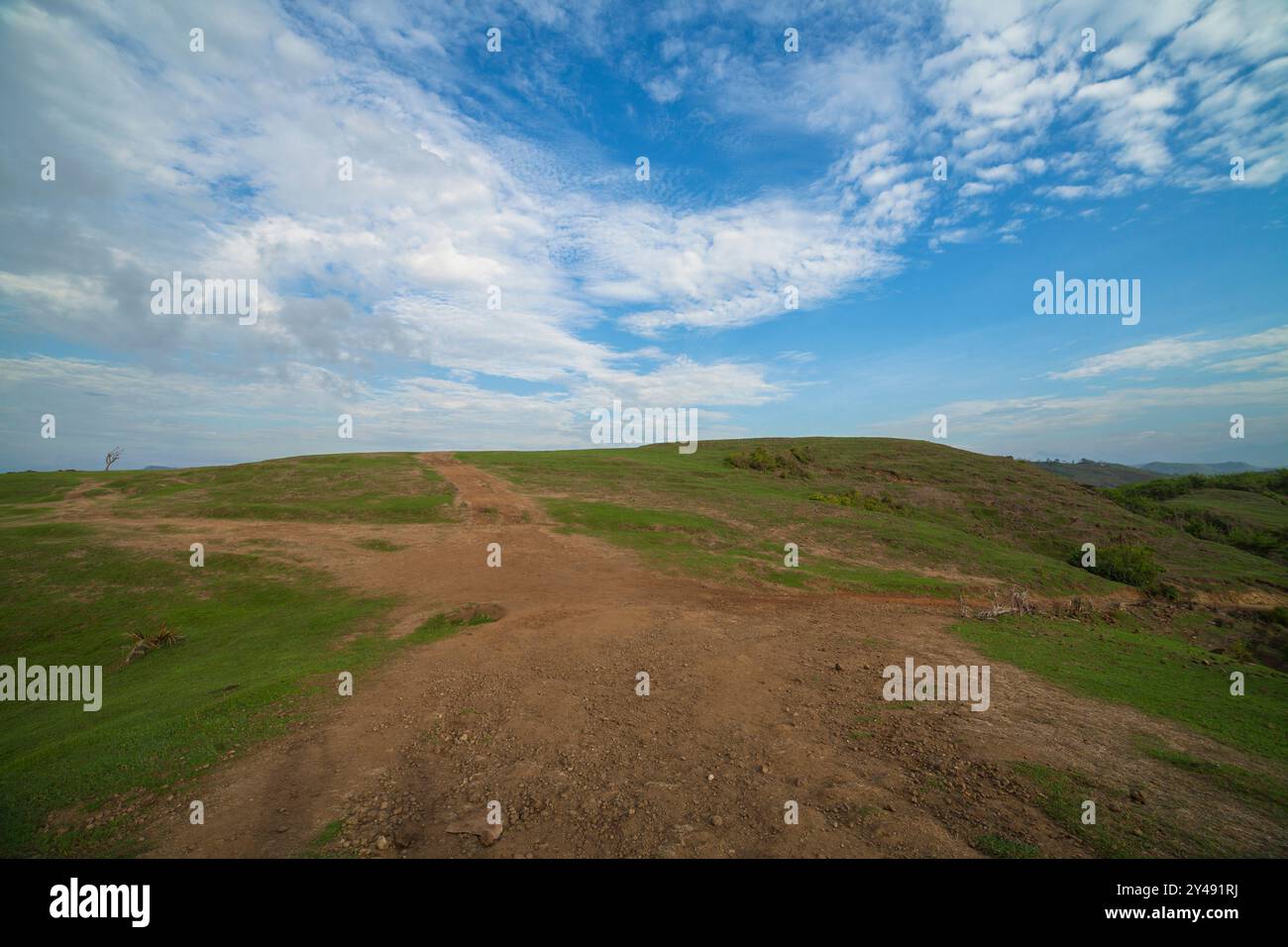 The meadows are barren and the sky is blue Stock Photo - Alamy