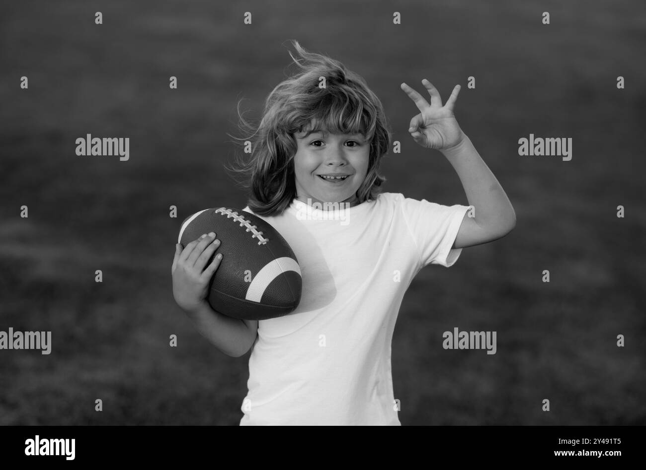 Child rugby player Black and White Stock Photos & Images - Alamy
