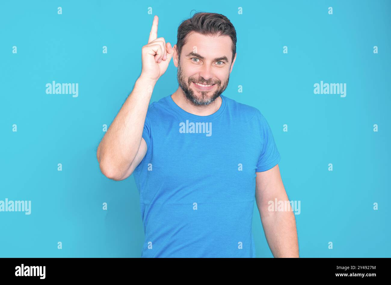 Happy man thinking of idea on studio background. Portrait of man has ...