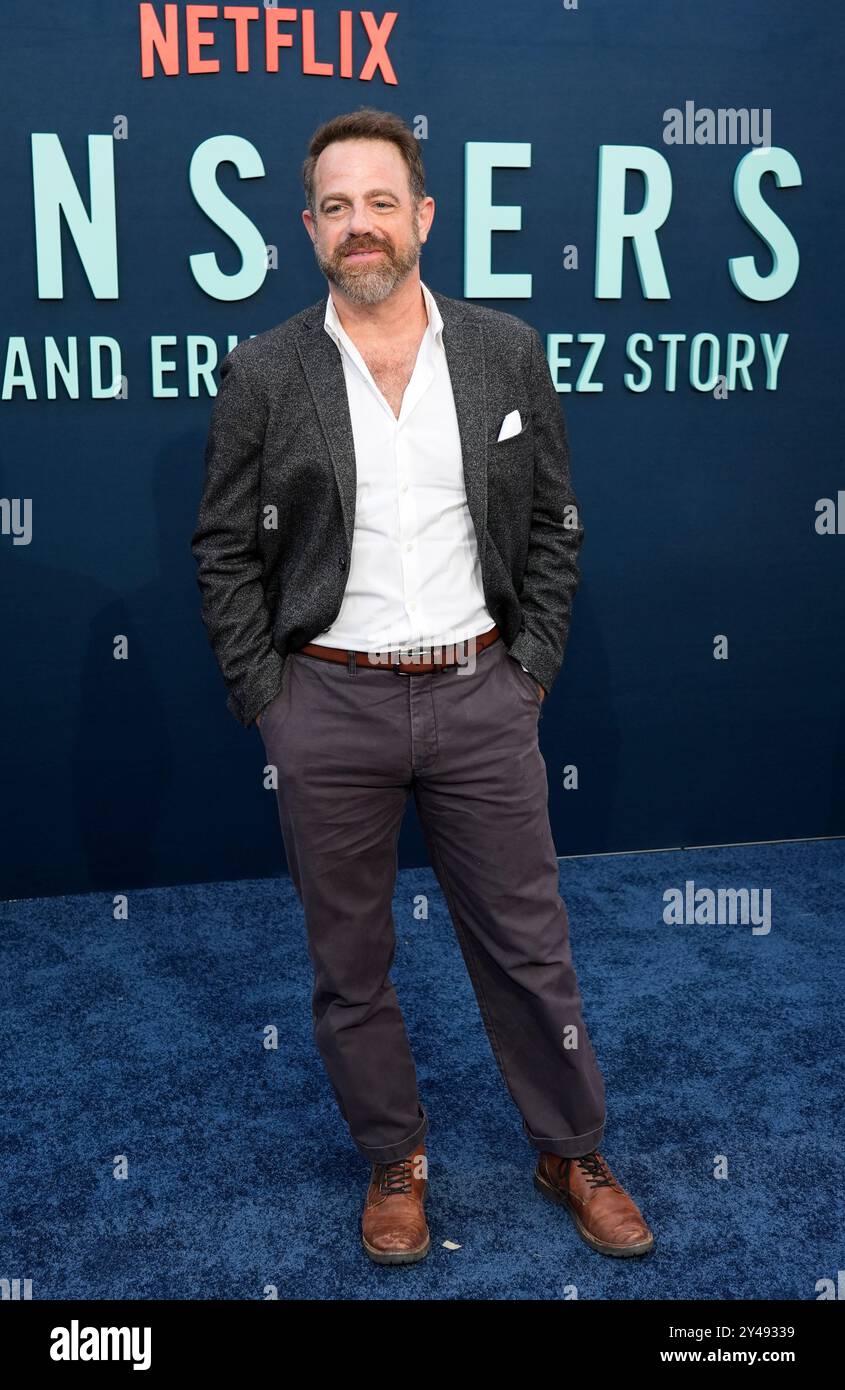 Paul Adelstein poses at the premiere of the Netflix series "Monsters: The Lyle and Erik Menendez ...