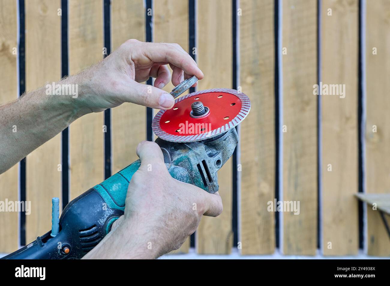 On angle grinder mounted abrasive diamond disc for cutting stone Stock ...
