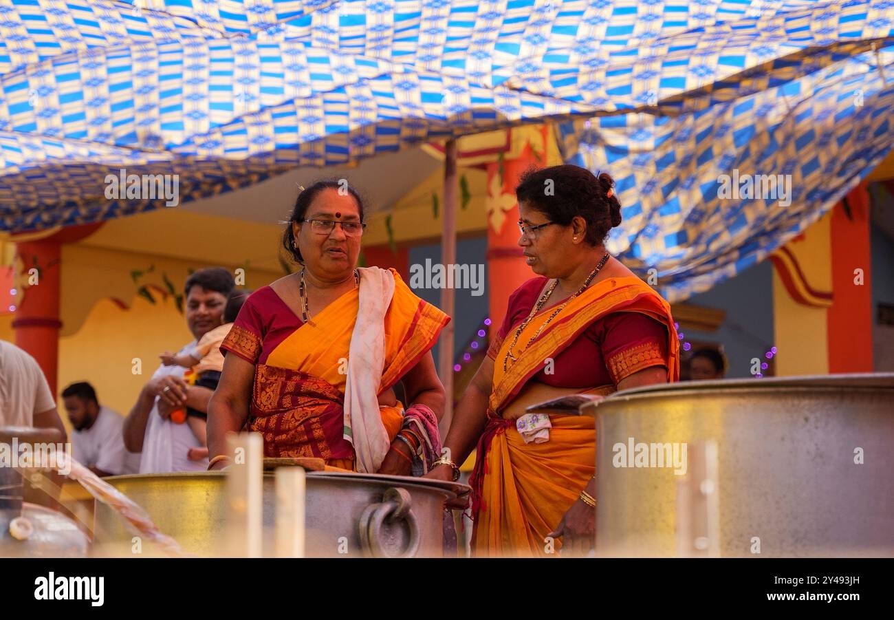 GOA, India - February 22, 2024: Two mature women stand in traditional ...