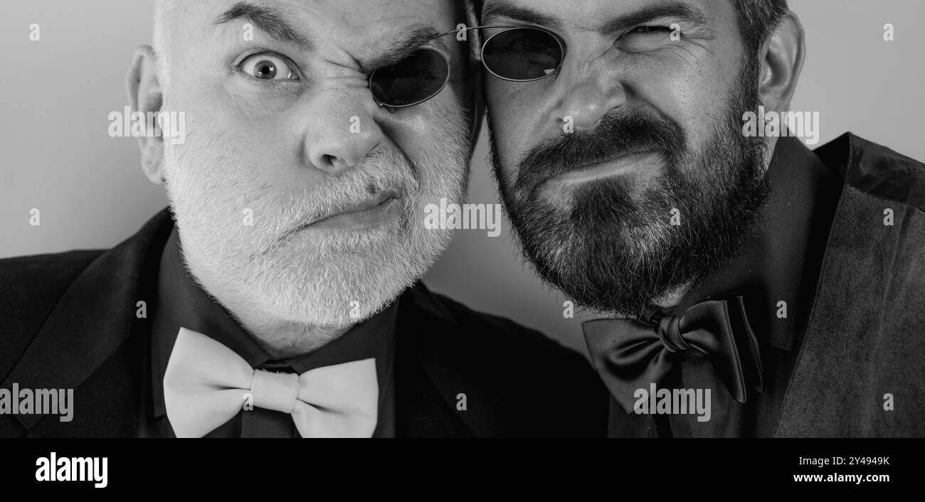 Two hipsters wear sunglasses. Men joking. Comic and humor sense. Men ...