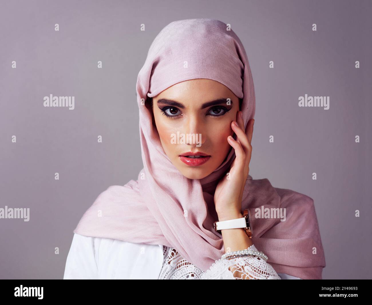 Touch, portrait and raya with muslim woman in studio for islamic style ...