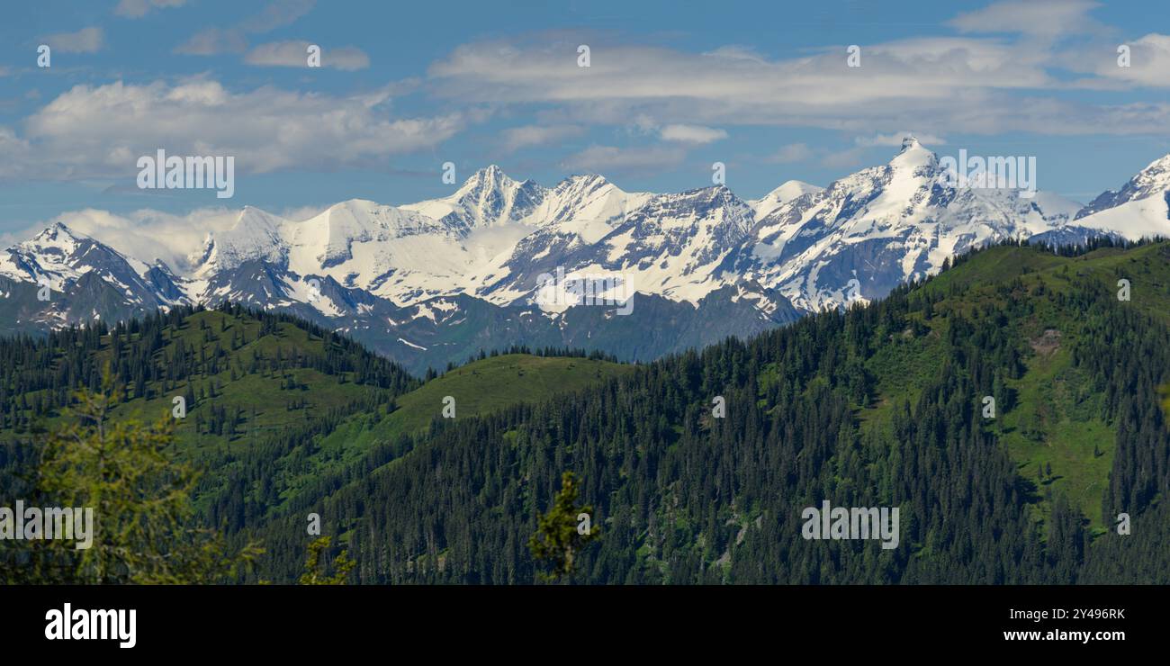 The Glockner Group mountains on a sunny day in springtime, the center section of the main chain ...
