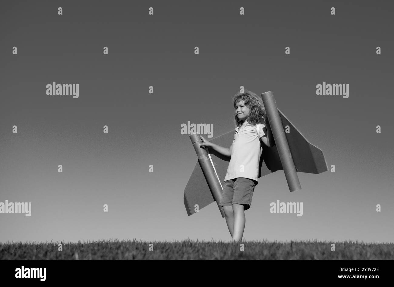 Boy child with wings at sky imagines a pilot and dreams of flying Stock ...