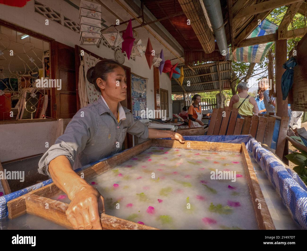 LAOS, LUANG PRABANG, PRODUCTION OF VEGETABLE FIBER-BASED PAPER Stock ...
