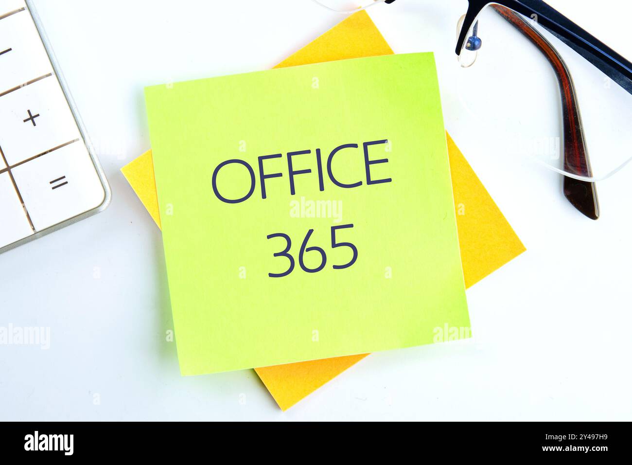 OFFICE 365 words written on a light green sticker on a light background ...