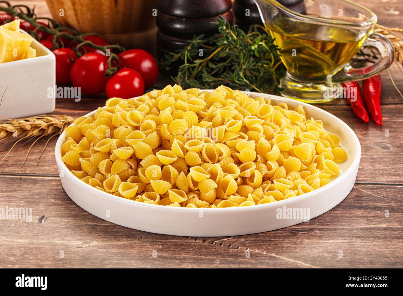 Italian cuisine - dry conchiglie shell pasta Stock Photo - Alamy