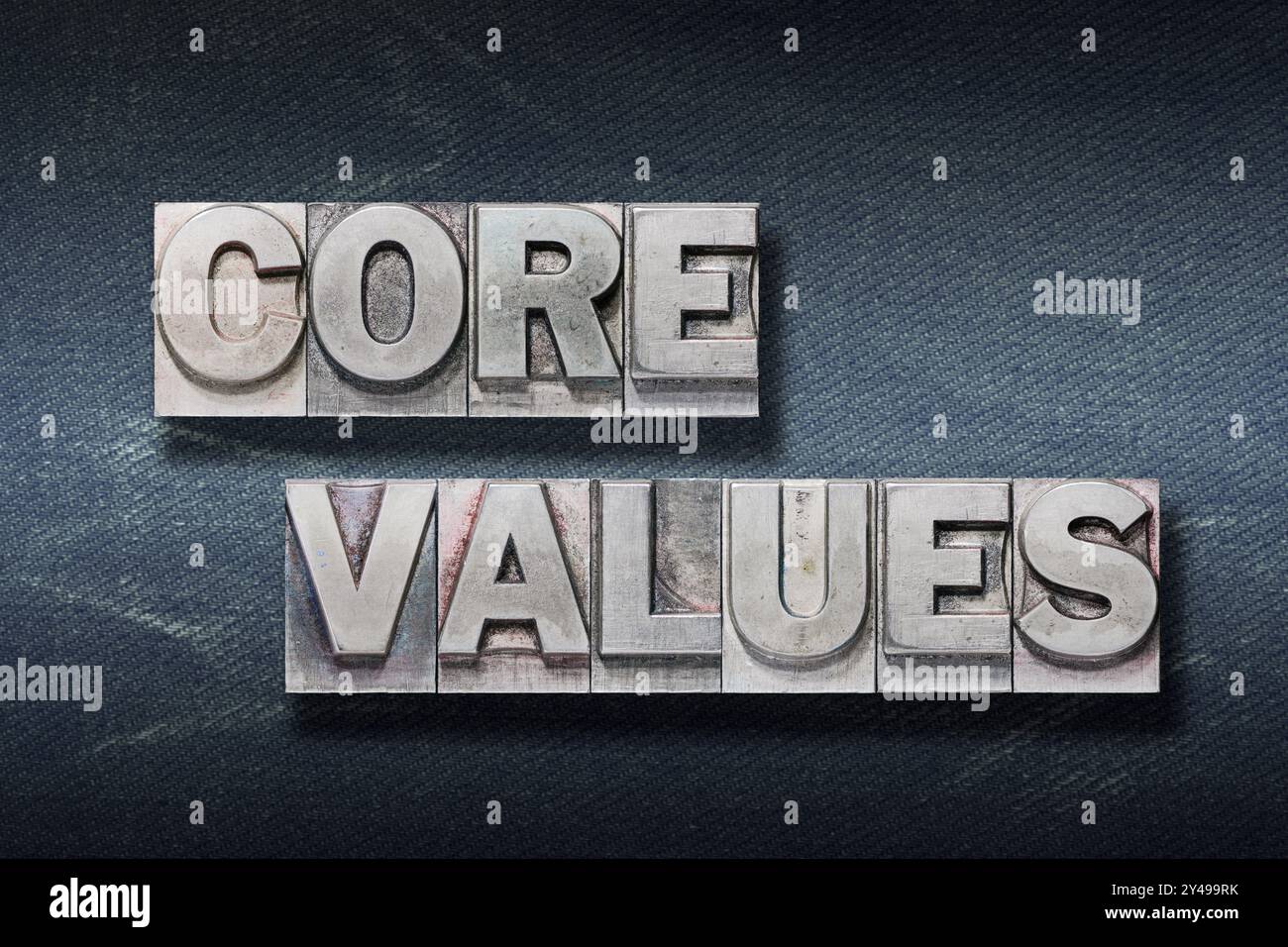 core values phrase made from metallic letterpress on dark jeans background Stock Photo - Alamy