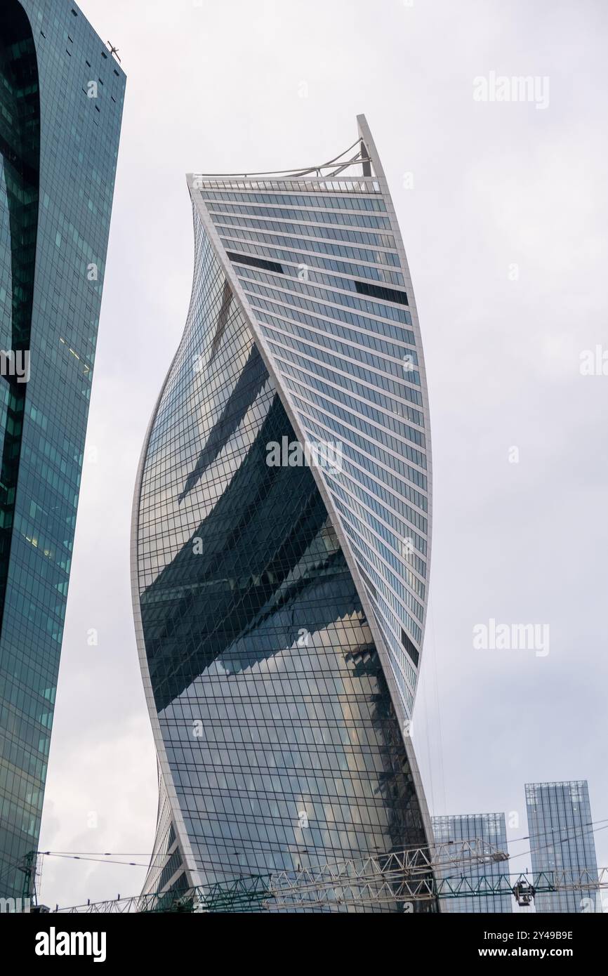 Modern Moscow City towers against a blue sky. Tall glass skyscrapers ...