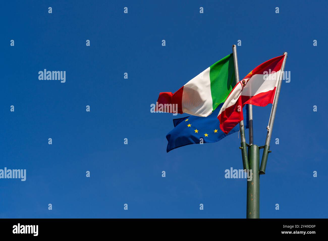 Italian Austrian and EU flags waving in clear sky Stock Photo - Alamy