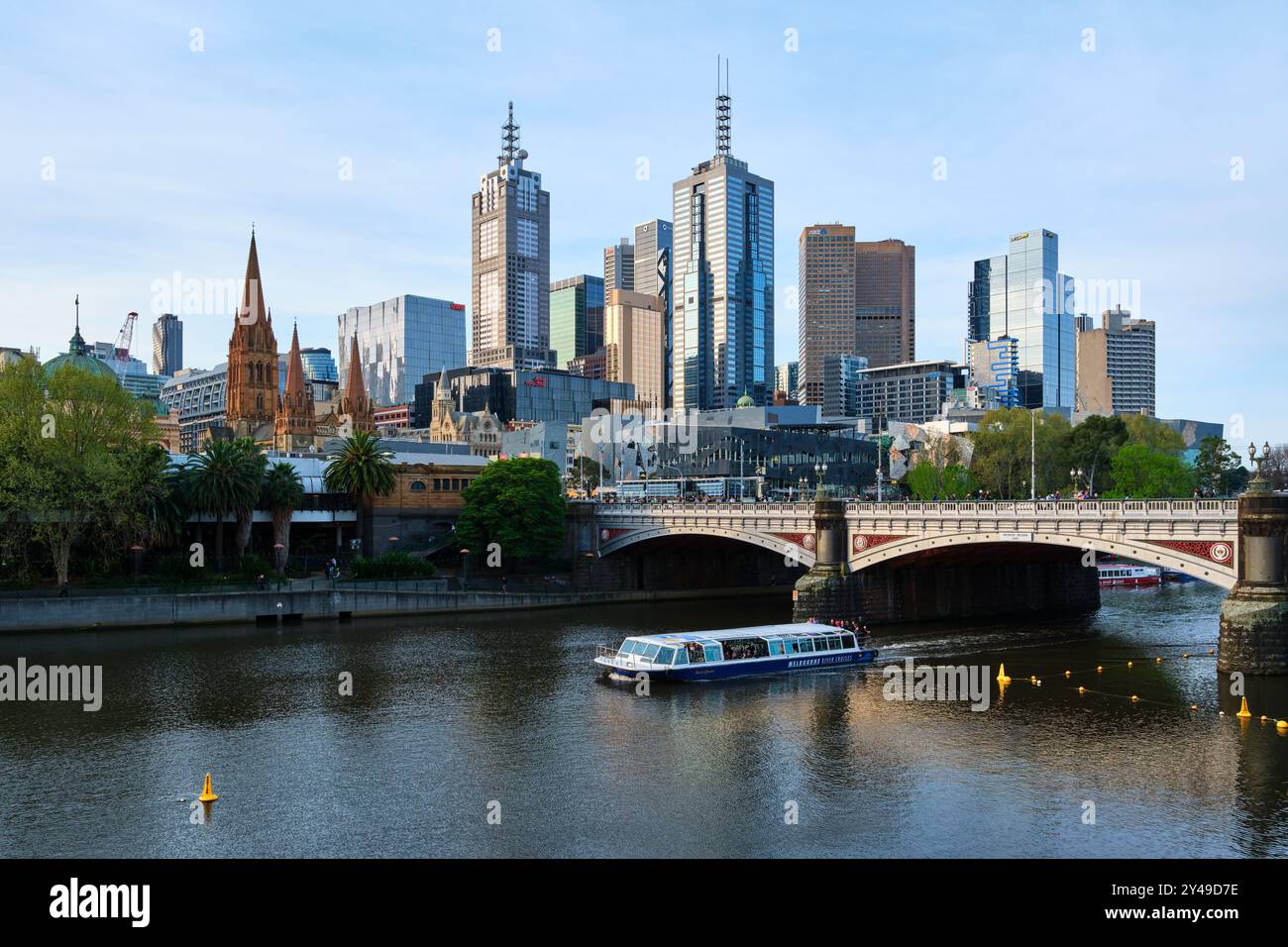 View across the Yarra River to Princes Bridge, the Yarra Queen and the ...