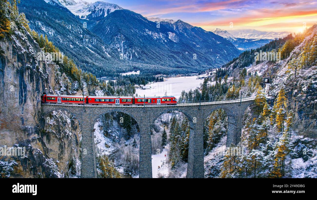 Aerial view of Train passing through famous mountain in Filisur ...