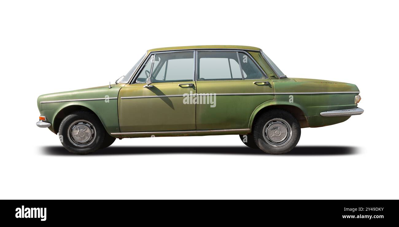 Abandoned & rusty classic French car side view isolated on white ...