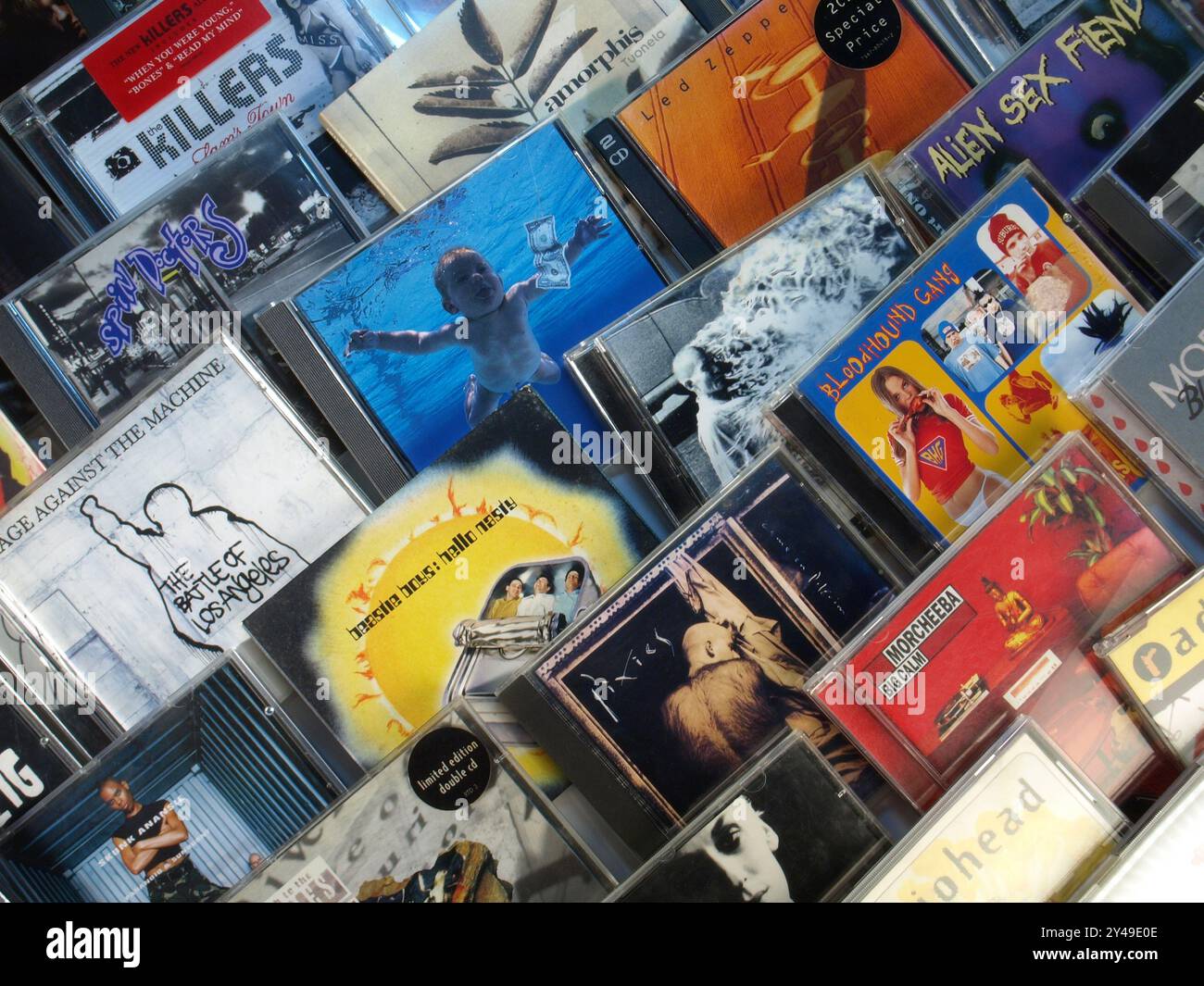 Music Exhibition - Music CD Covers Background - CDs in Plasic Cover ...