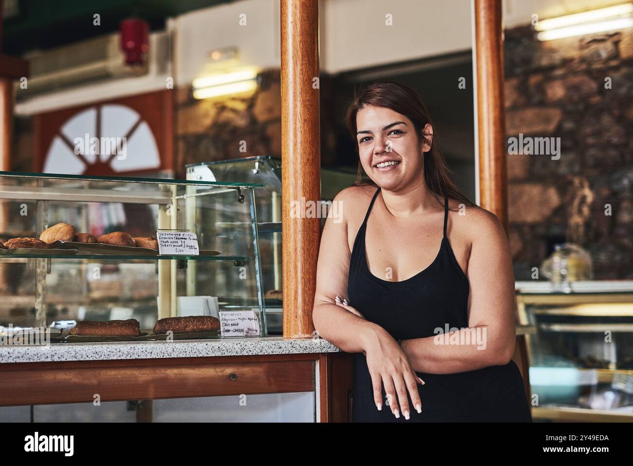 Bakery, smile and portrait of woman in store for small business ...