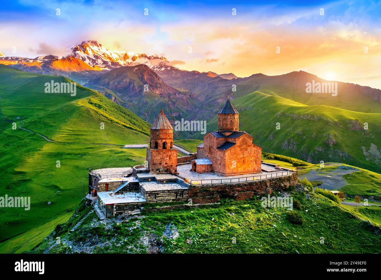 Aerial view of Gergeti trinity church at sunrise in Georgia Stock Photo ...