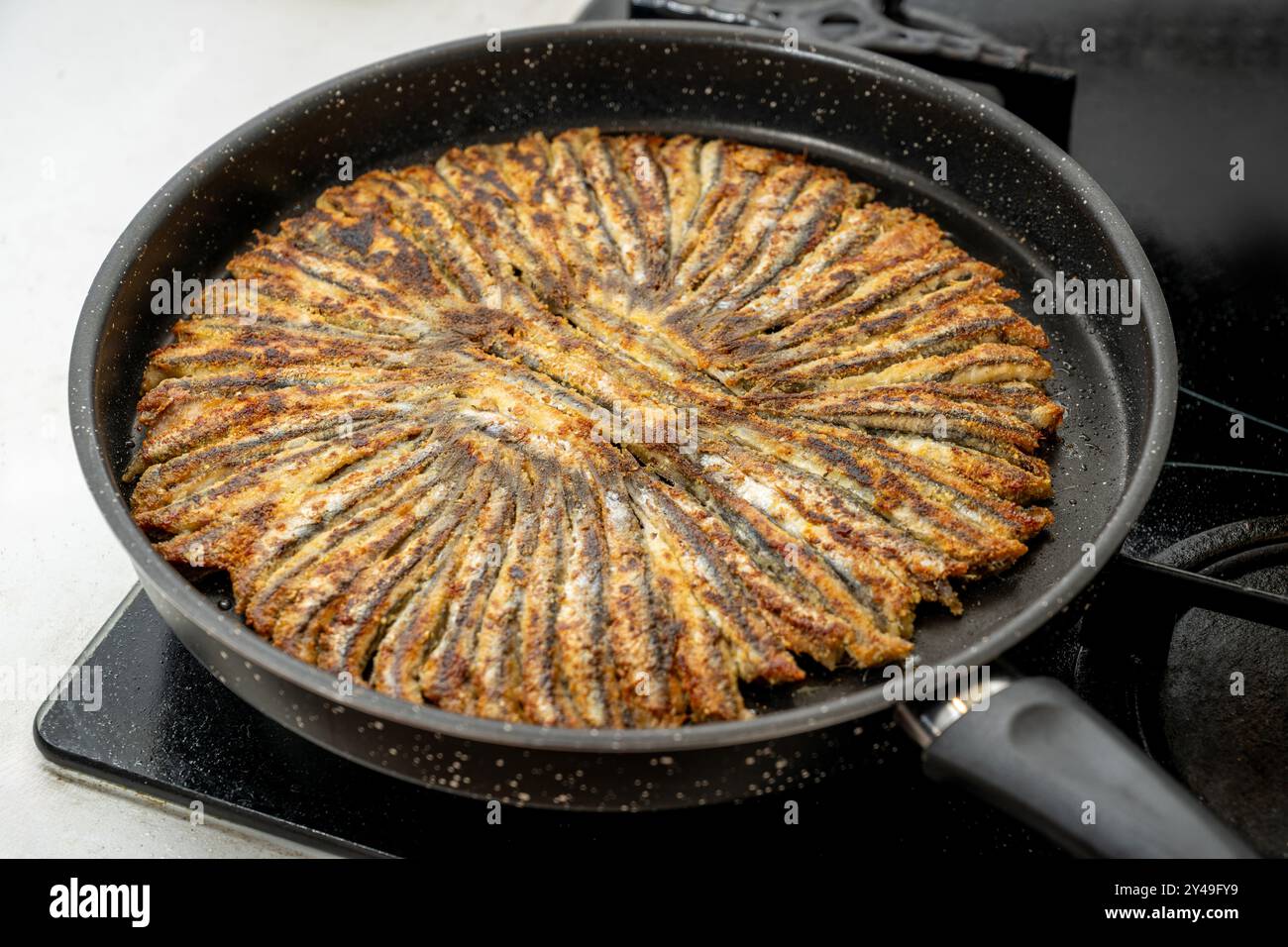 Fried anchovies ( Hamsi Tava ), a traditional Turkish delicacy Stock ...