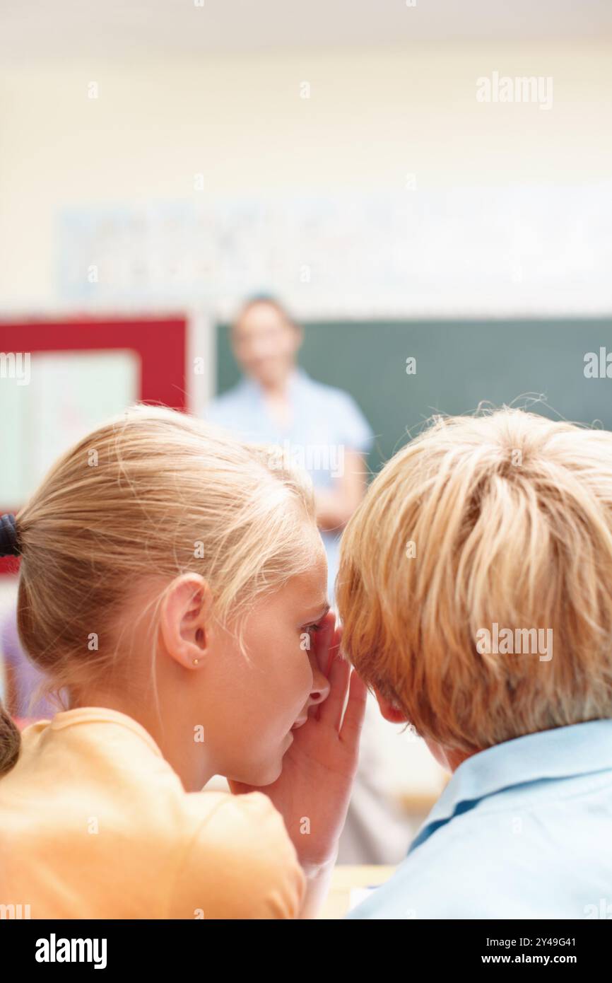 Whisper, students and kids with gossip, back and conversation with ...