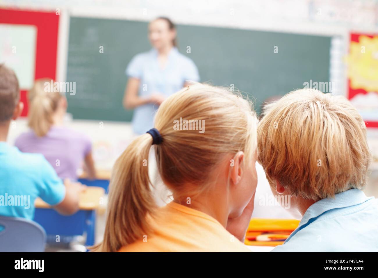 Whisper, students and kids in classroom, back and conversation with ...