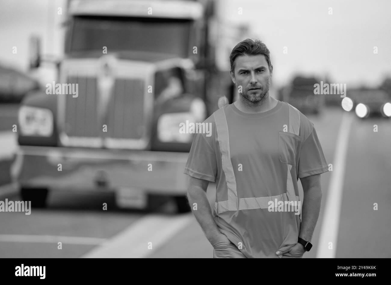 Men driver near lorry truck. Man owner truck driver in safety vest near ...