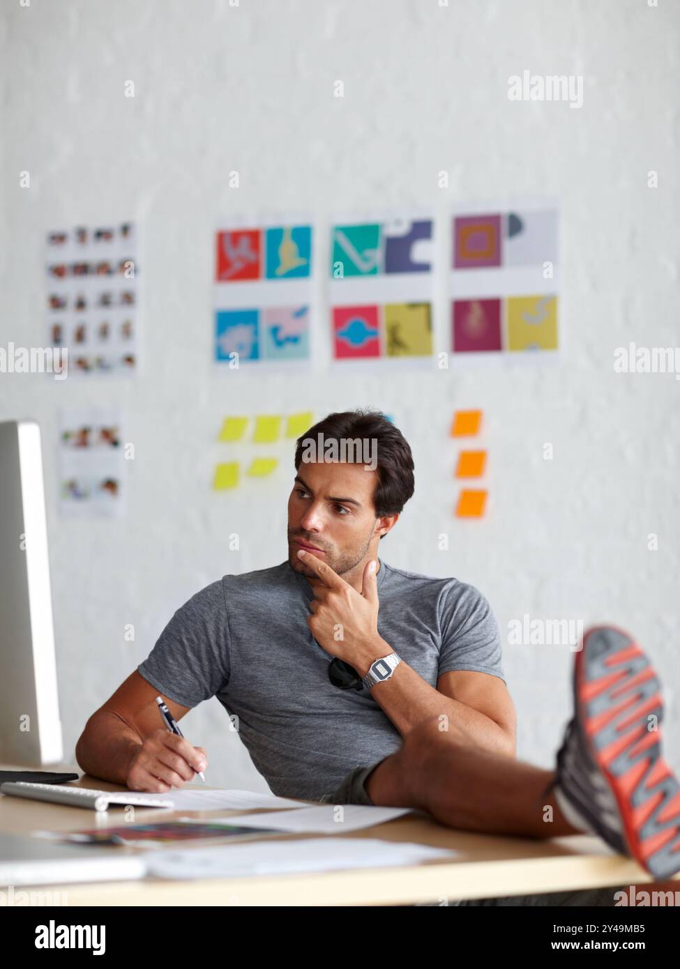 Creative, man and thinking by computer in office for project budget ...