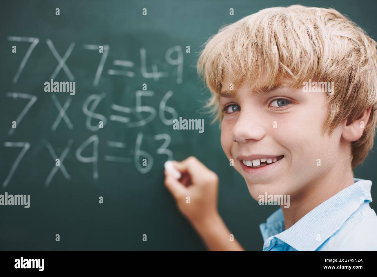 Math, student and portrait at chalkboard at school with problem solving ...