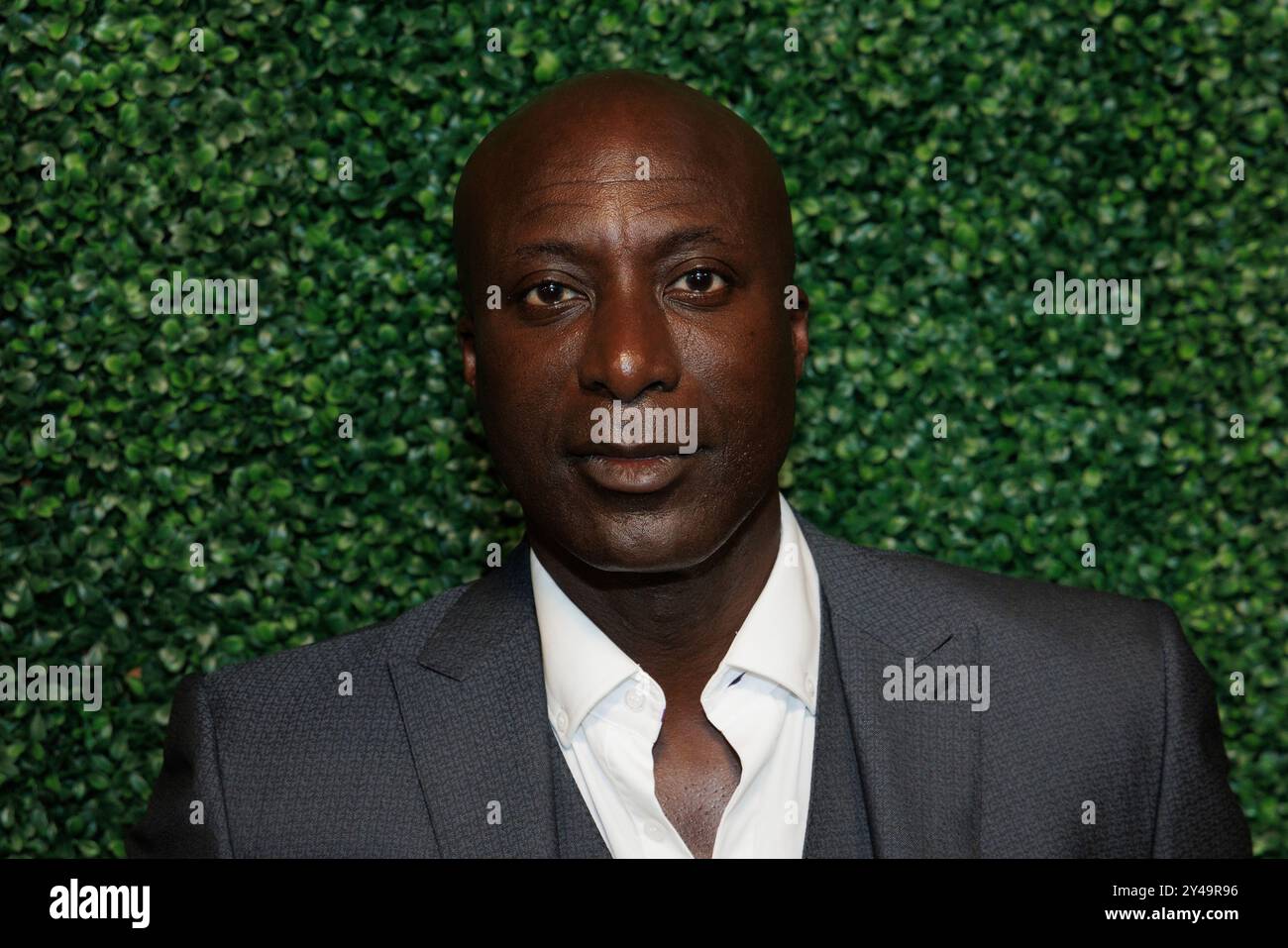 Ozwald Boateng poses for photographers upon arrival for the premiere of ...