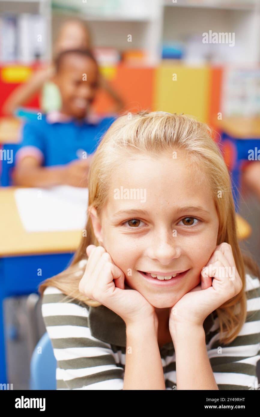 Happy, portrait and girl in classroom for learning, growth and child ...