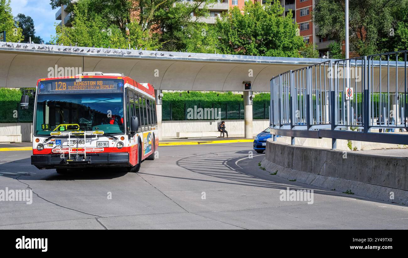 Public transportation bus driving in Victoria Park Station Stock Photo ...