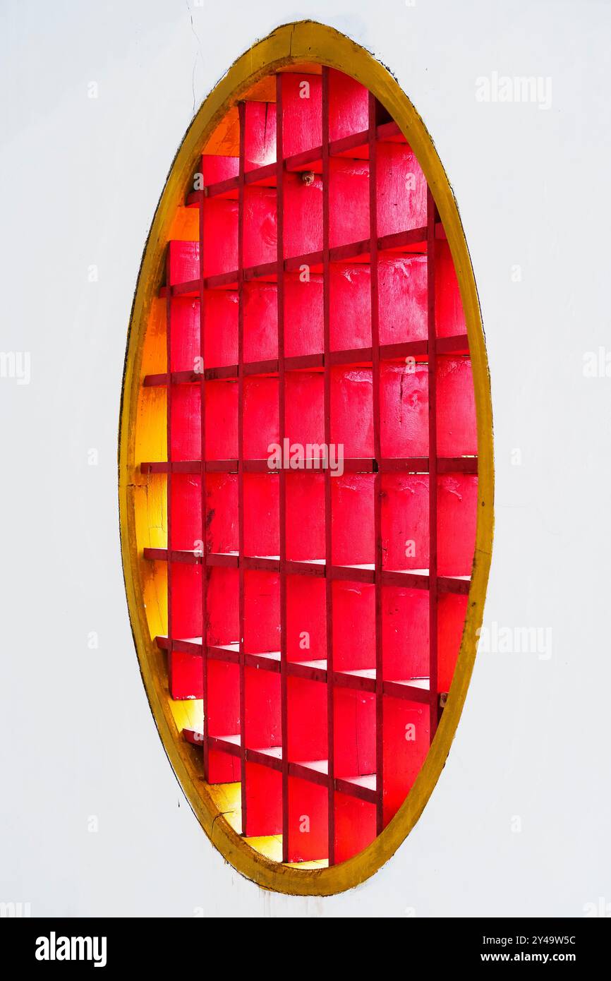 Hindu temple window at this tourist park with a peace tower, worship ...