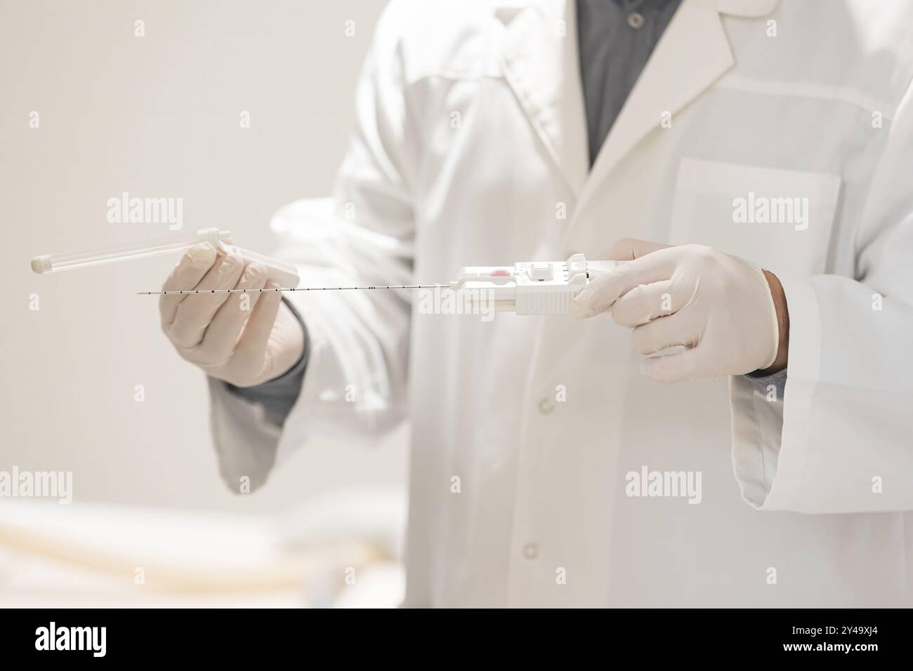 Doctor prepare prostate cancer biopsy device for use Stock Photo - Alamy
