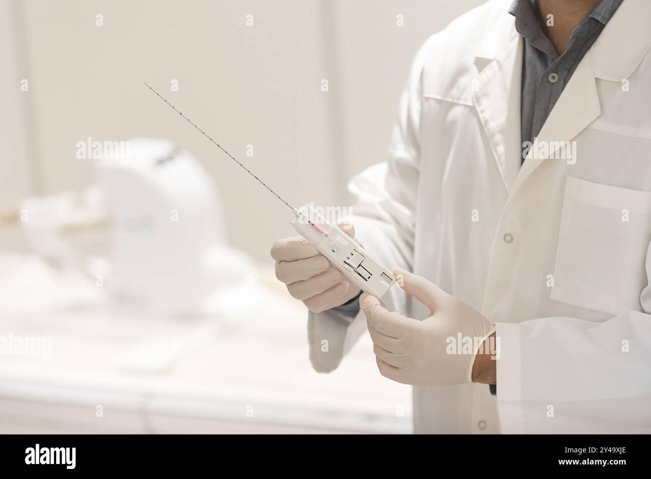 Doctor prepare prostate cancer biopsy device for use Stock Photo - Alamy