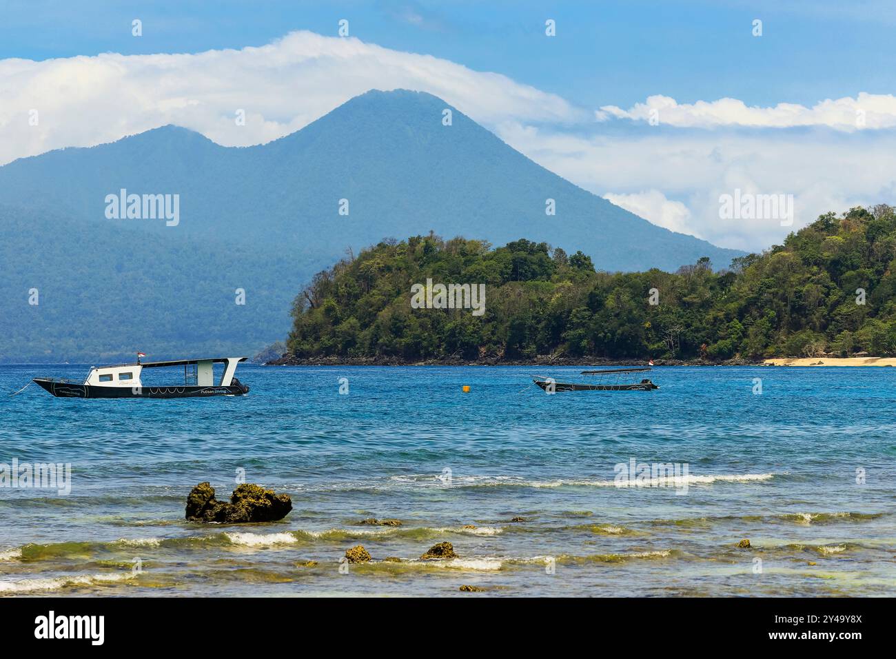 Pulisan beach with tangkoko mountain hi-res stock photography and ...