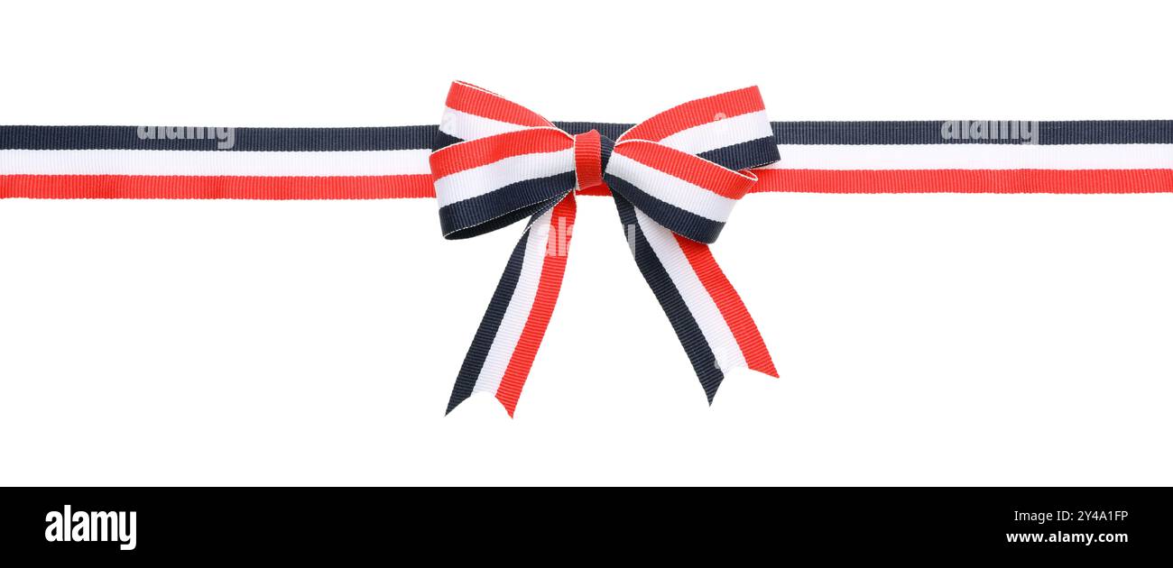 Ribbon with bow in colors of Yemeni flag isolated on white, top view ...