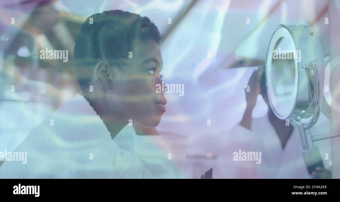 Image of water ripples over happy african american woman combing hair ...