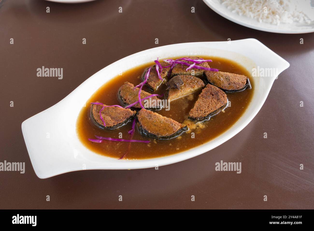 Vegan tofu fish fillets in gravy Stock Photo - Alamy