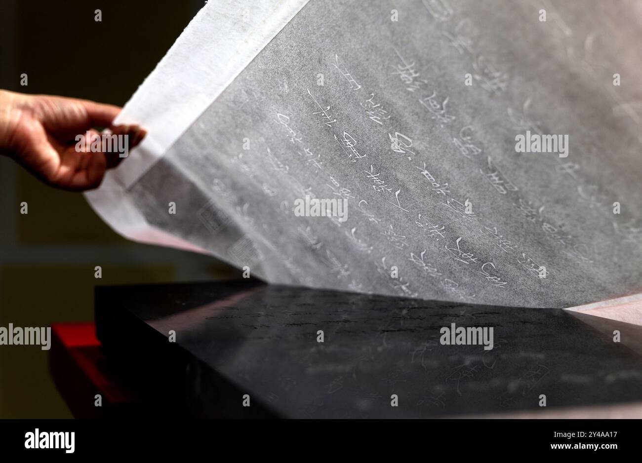 (240917) -- LUOYANG, Sept. 17, 2024 (Xinhua) -- Qian Xiayu uncovers a ...