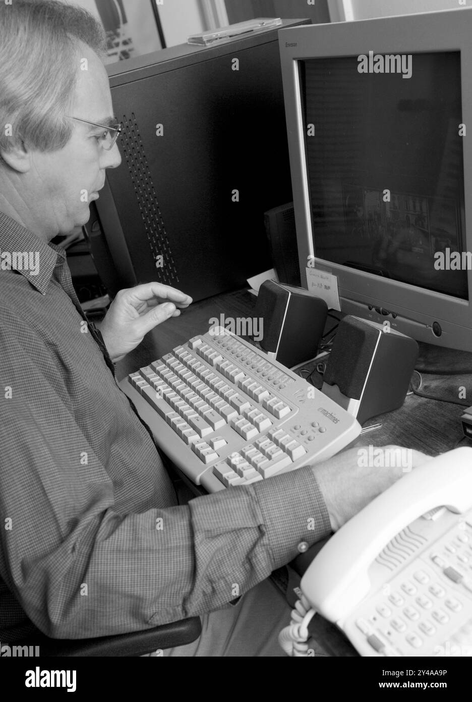 Male worker using digital computer Black and White Stock Photos ...