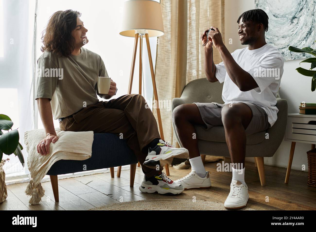 A joyful couple enjoys a warm conversation while sipping drinks at ...