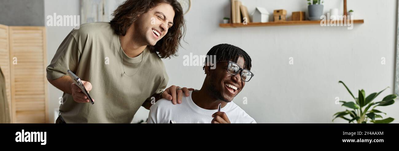 Two partners enjoy each other, laughing together while creating art at ...