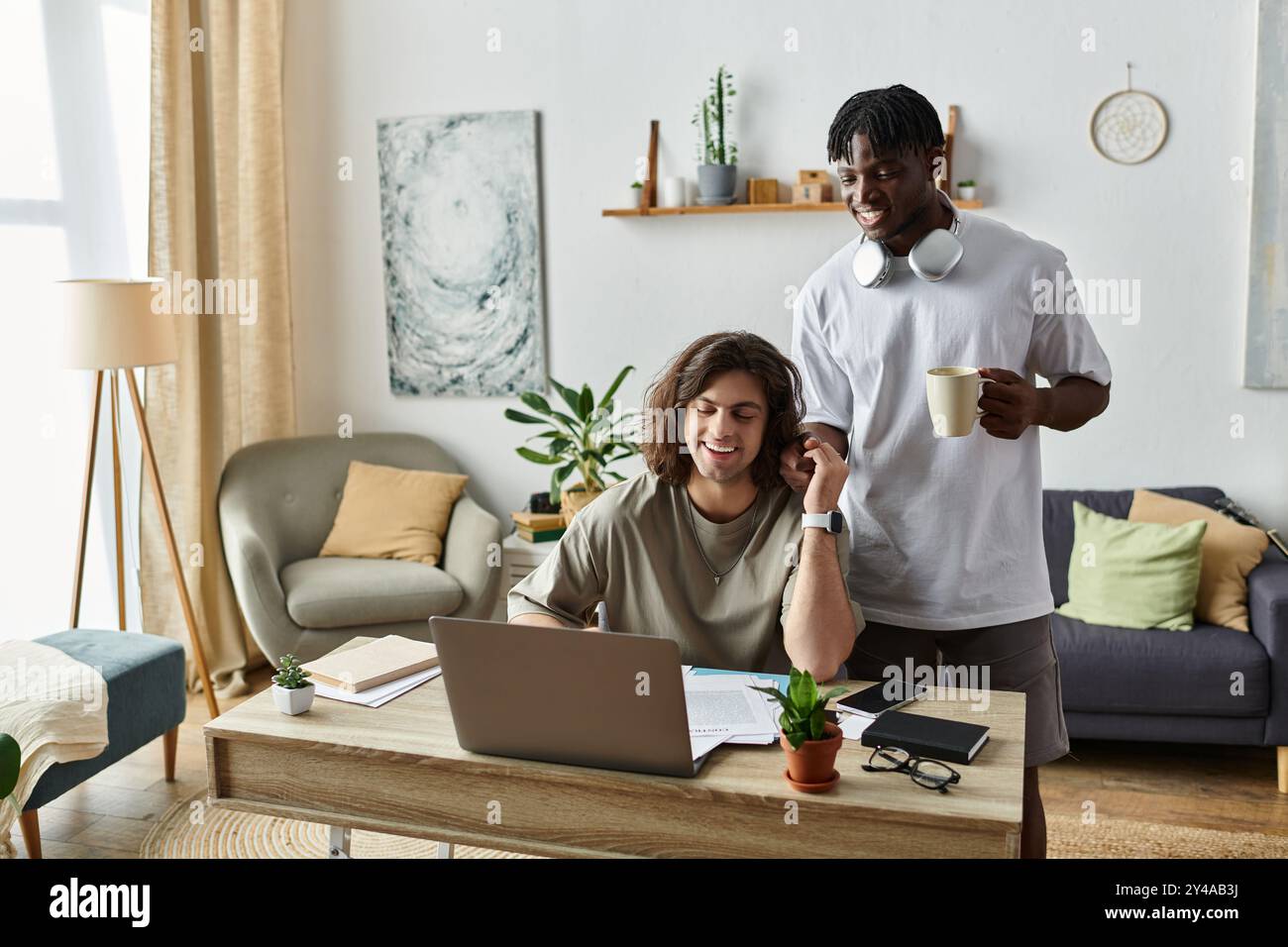 A couple enjoys quality time together, engaging in work and ...