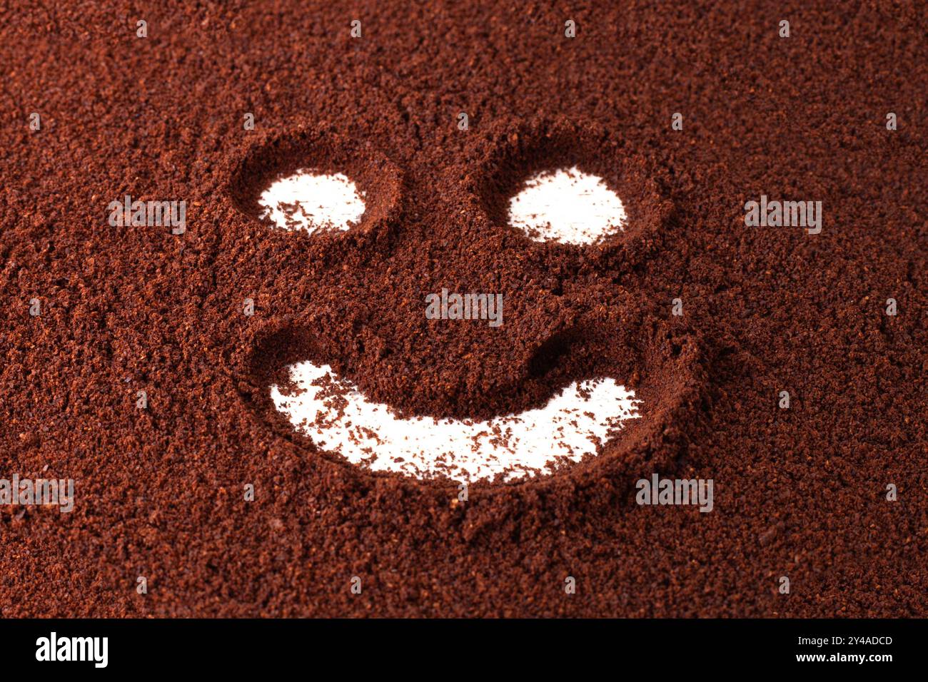 happy face symbol,painted in coffee powder Stock Photo - Alamy