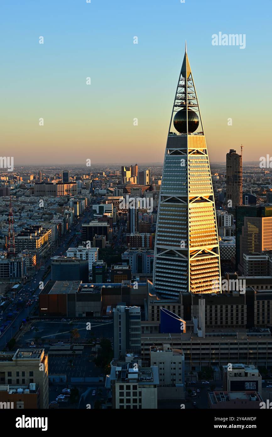 Al Faisaliyah Tower gleams in the evening light, standing tall amidst ...