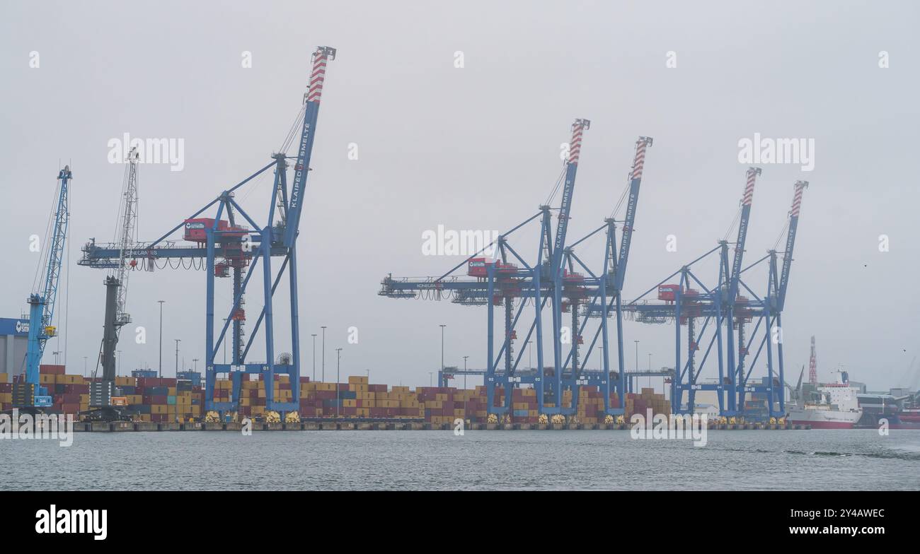 Cargo container terminal with cranes at Klaipeda sea port Stock Photo ...