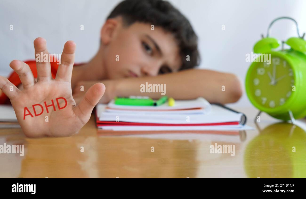 ADHD, Attention Deficit Disorder, child's palm with books and notebooks ...